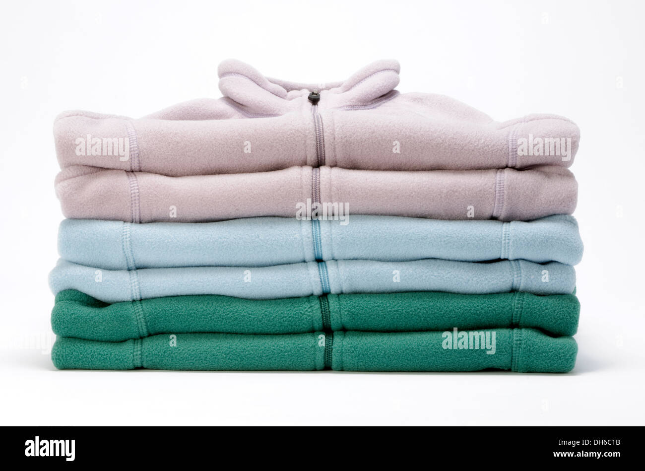 A stack soft pastel colored shirts Stock Photo - Alamy