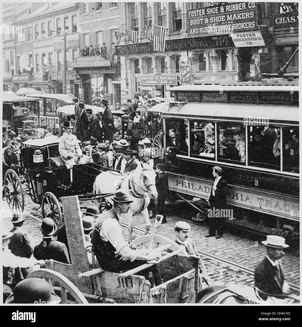 A bustling Philadelphia street in the late 19th century, featuring ...