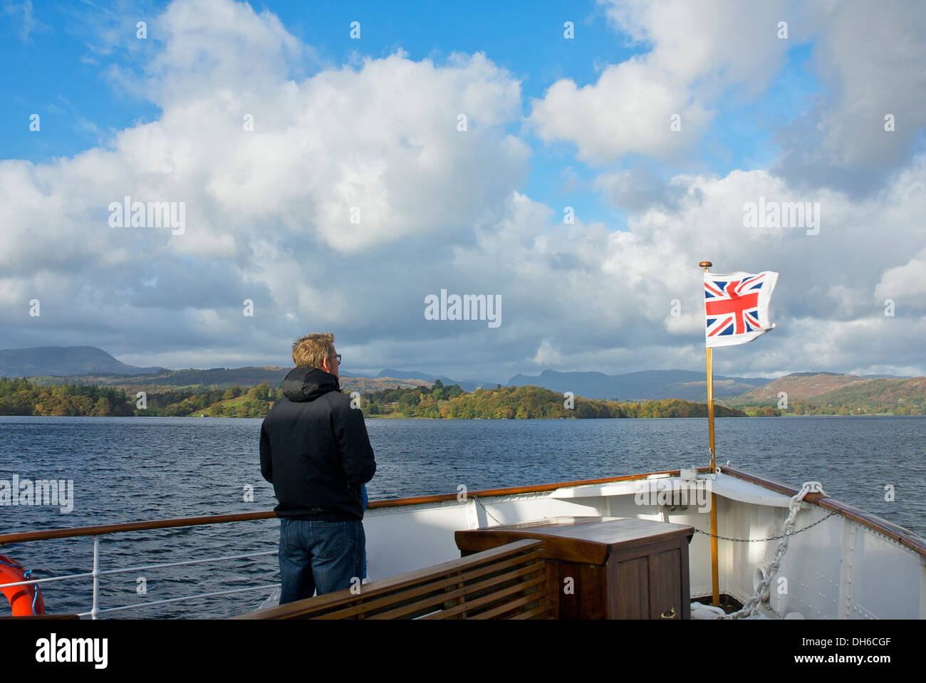 Man on steamer operated by Windermere Lake Cruises, Lake District ...