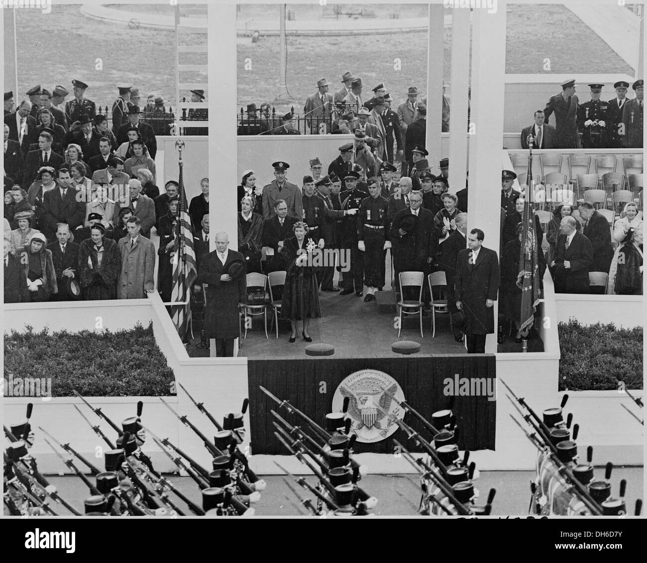 A photograph of President Dwight D. Eisenhower standing at attention ...