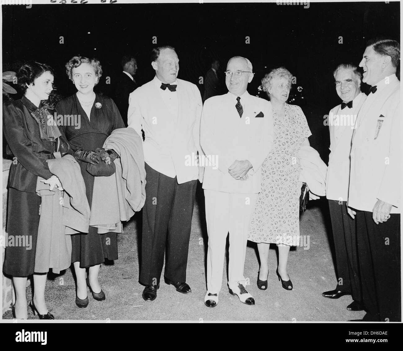 A photograph of President Harry S. Truman, First Lady Bess Truman, and ...