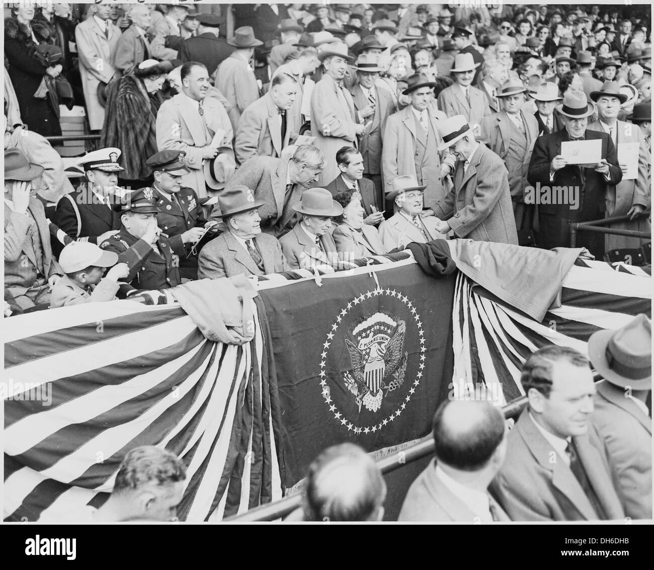 A photograph of President Truman, with Mrs. Truman and other ...