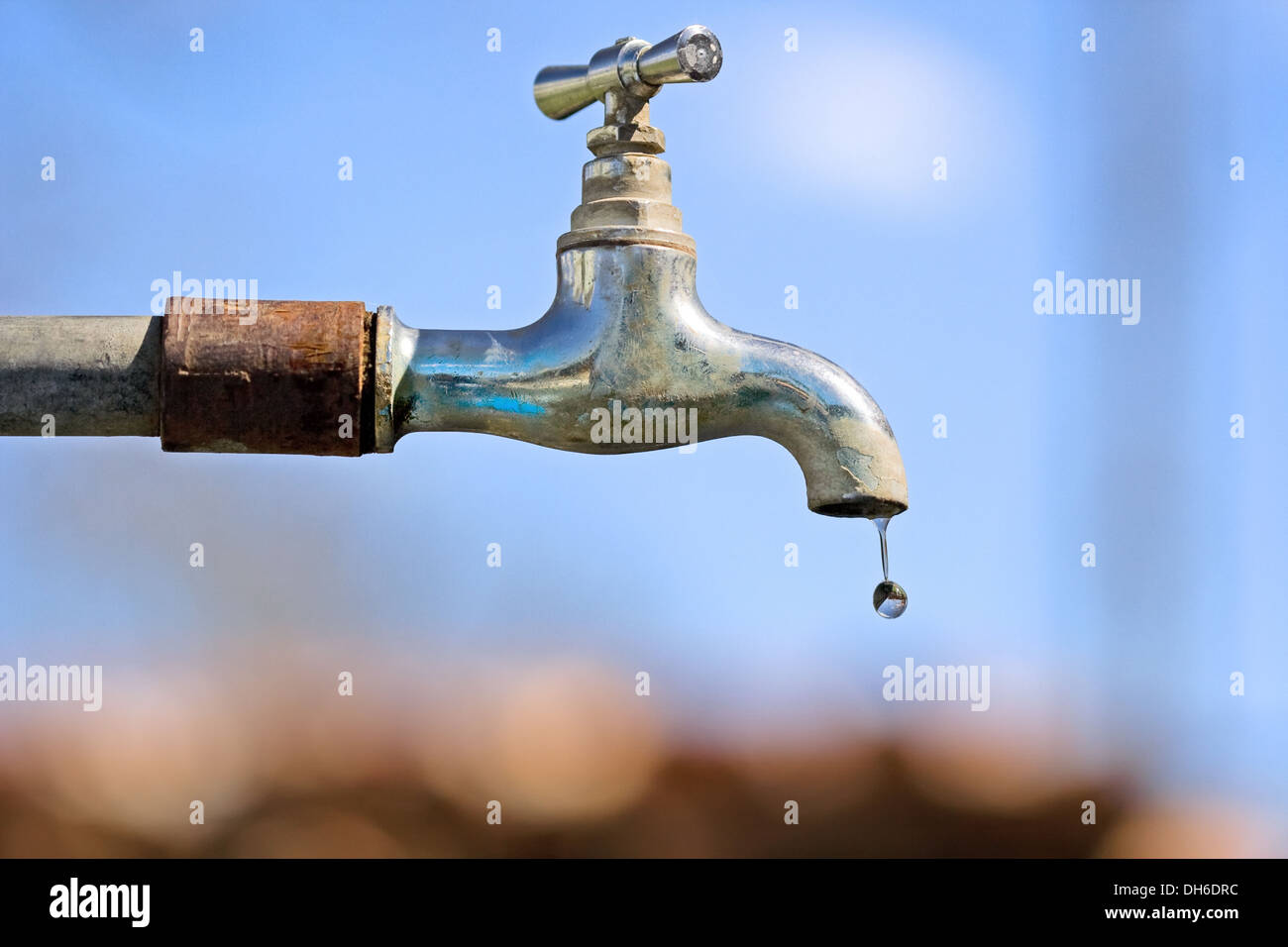 Falling water drop from tap hi-res stock photography and images - Alamy
