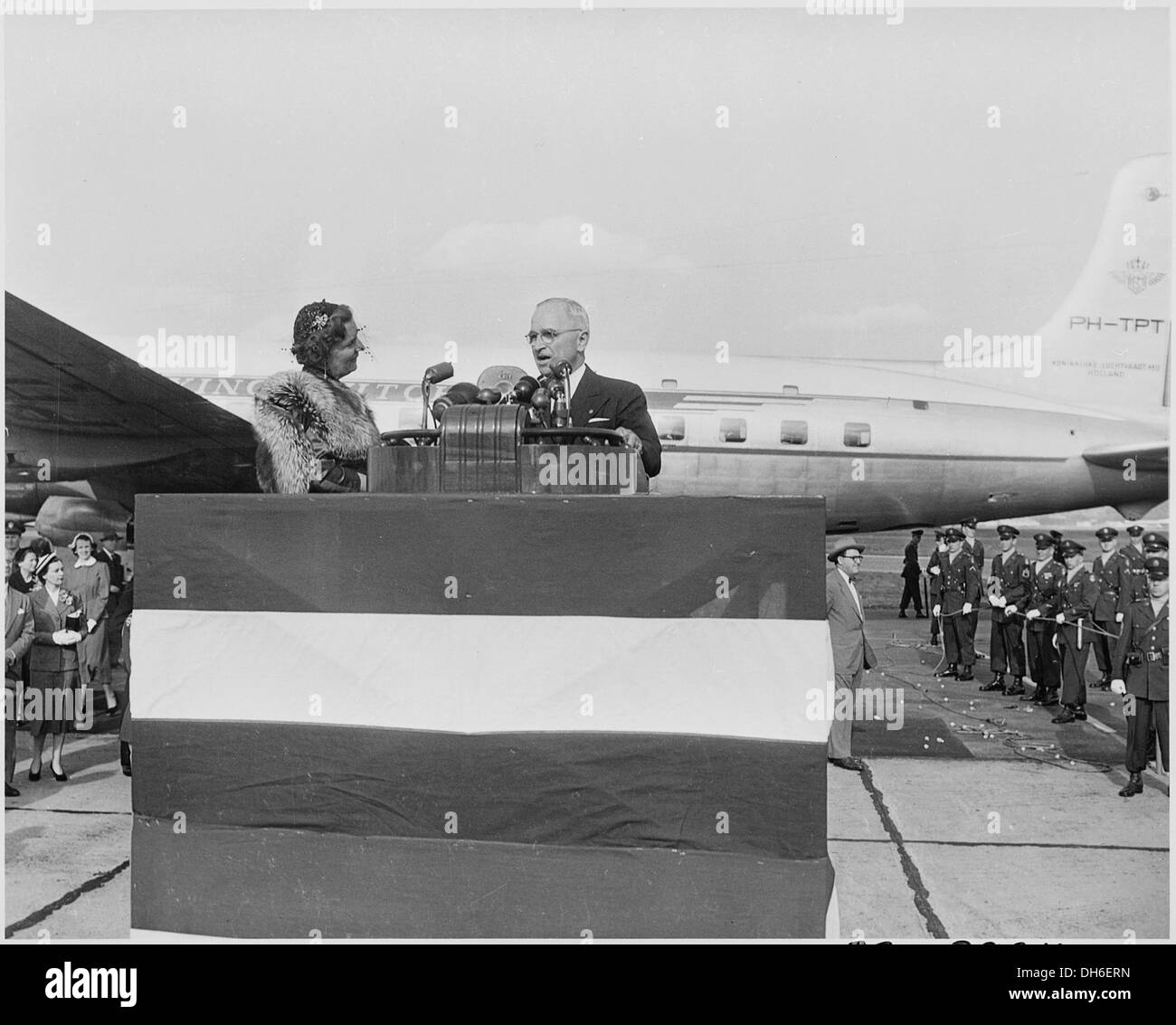 This photograph captures President Harry S. Truman welcoming Queen ...