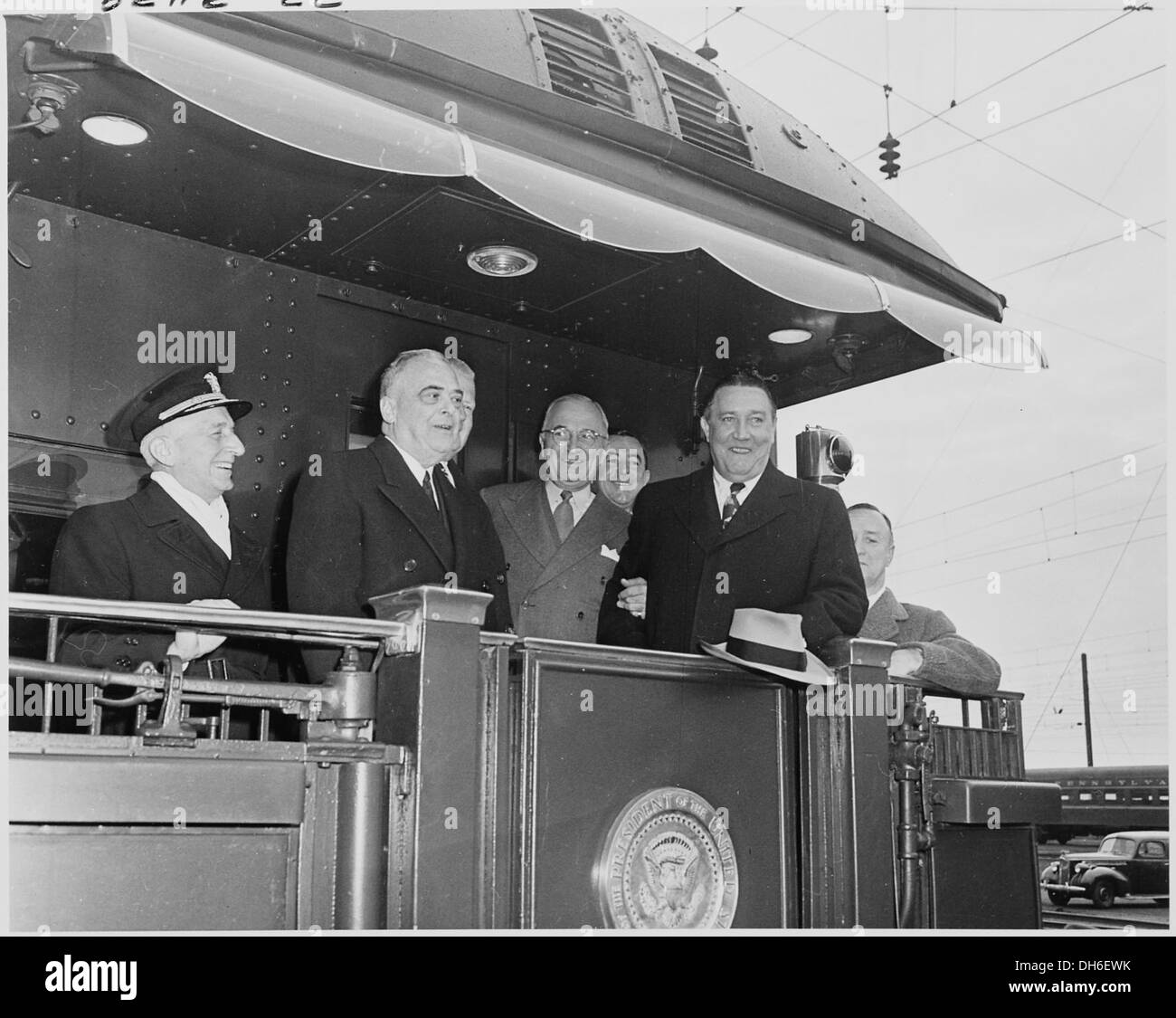 This photograph captures President Harry S. Truman with several ...