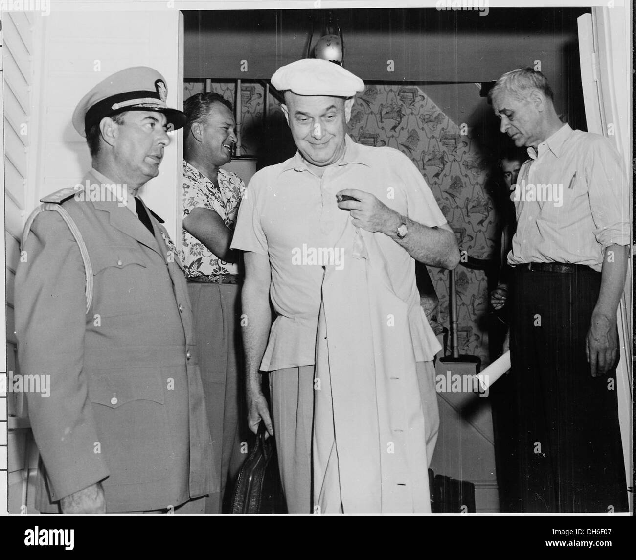 Secretary of Defense Louis Johnson departs from the Little White House ...