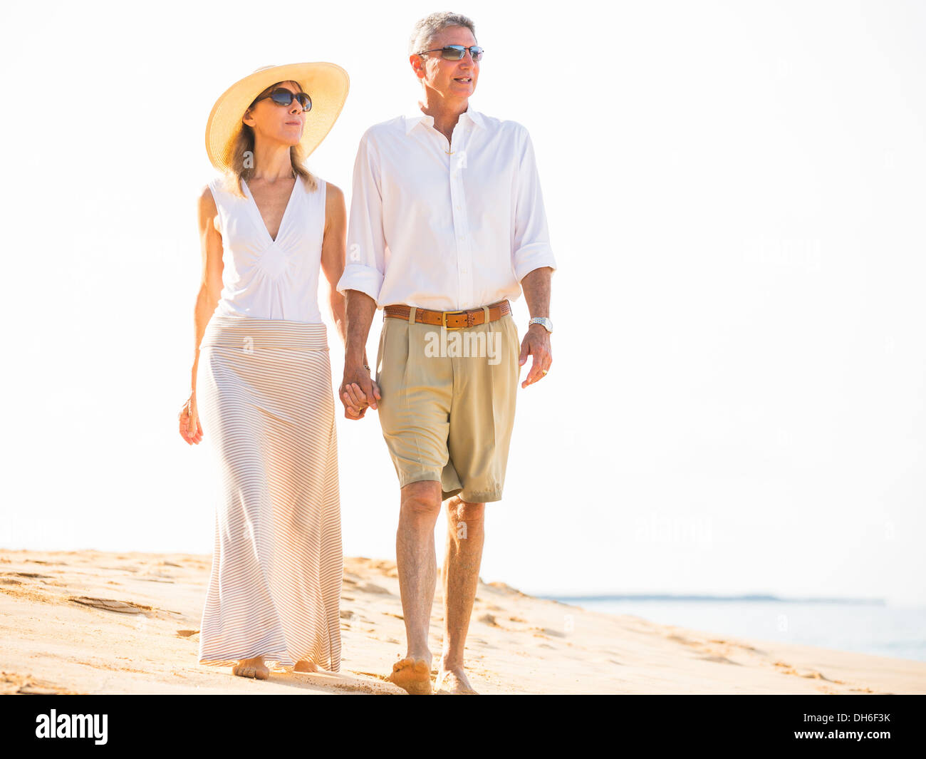 Happy senior couple on the beach. Retirement Luxury Tropical Resort ...