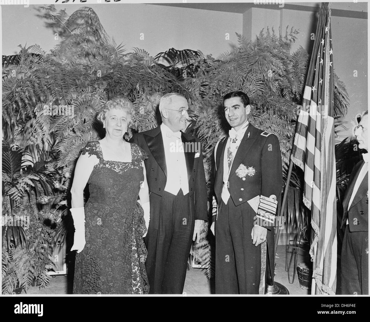 President Truman and Mrs. Truman are pictured with the Shah of Iran ...