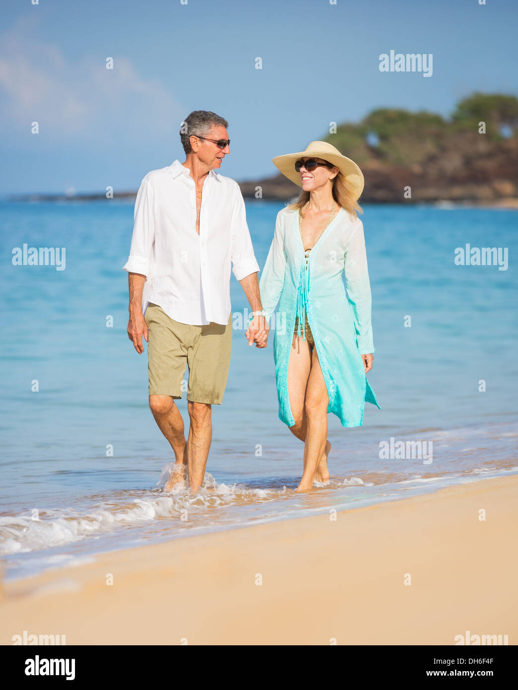Happy senior couple on the beach. Retirement Luxury Tropical Resort ...