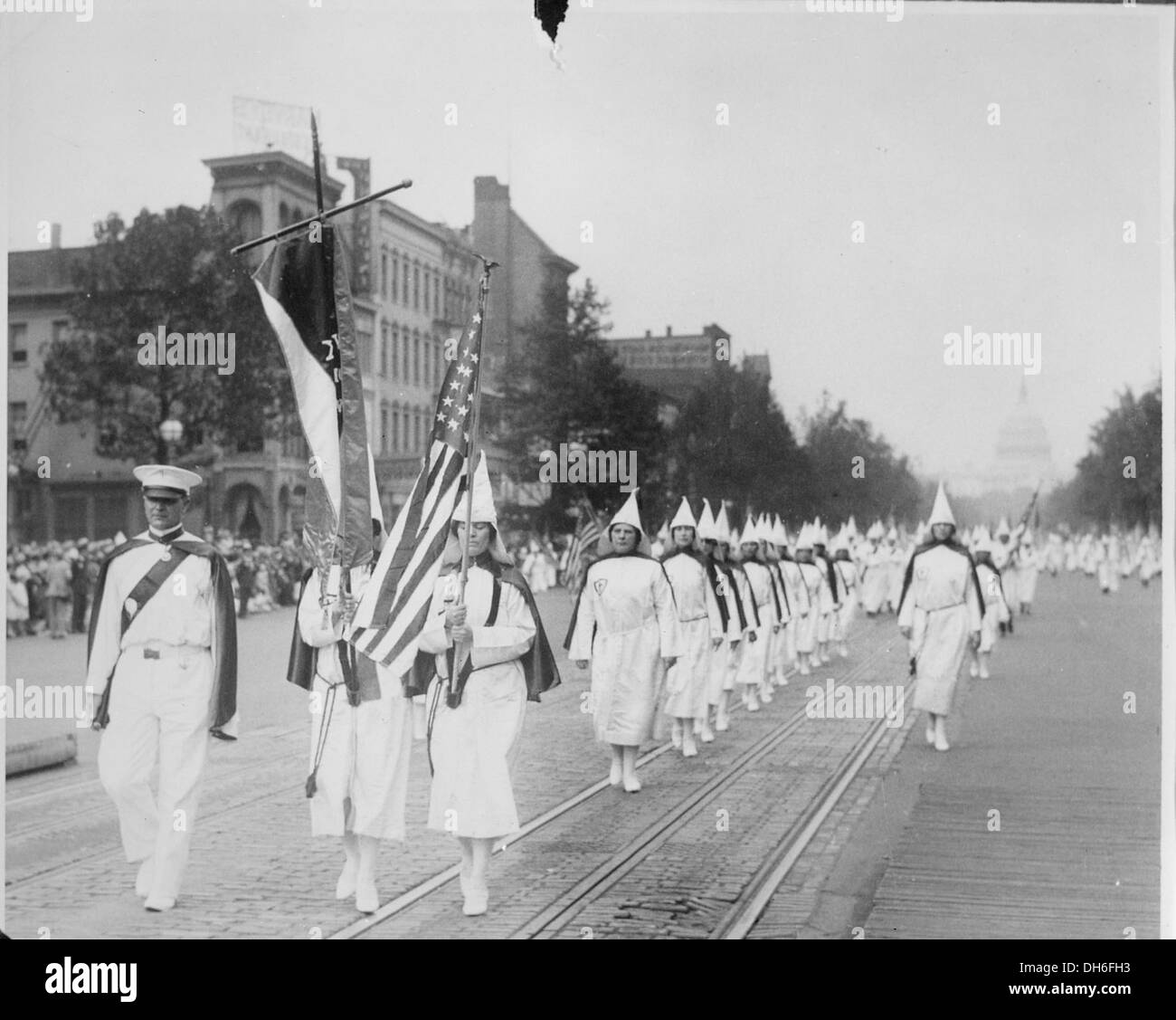 The Ku Klux Klan is depicted on parade down Pennsylvania Avenue in Washington D.C. in 1928. This ...