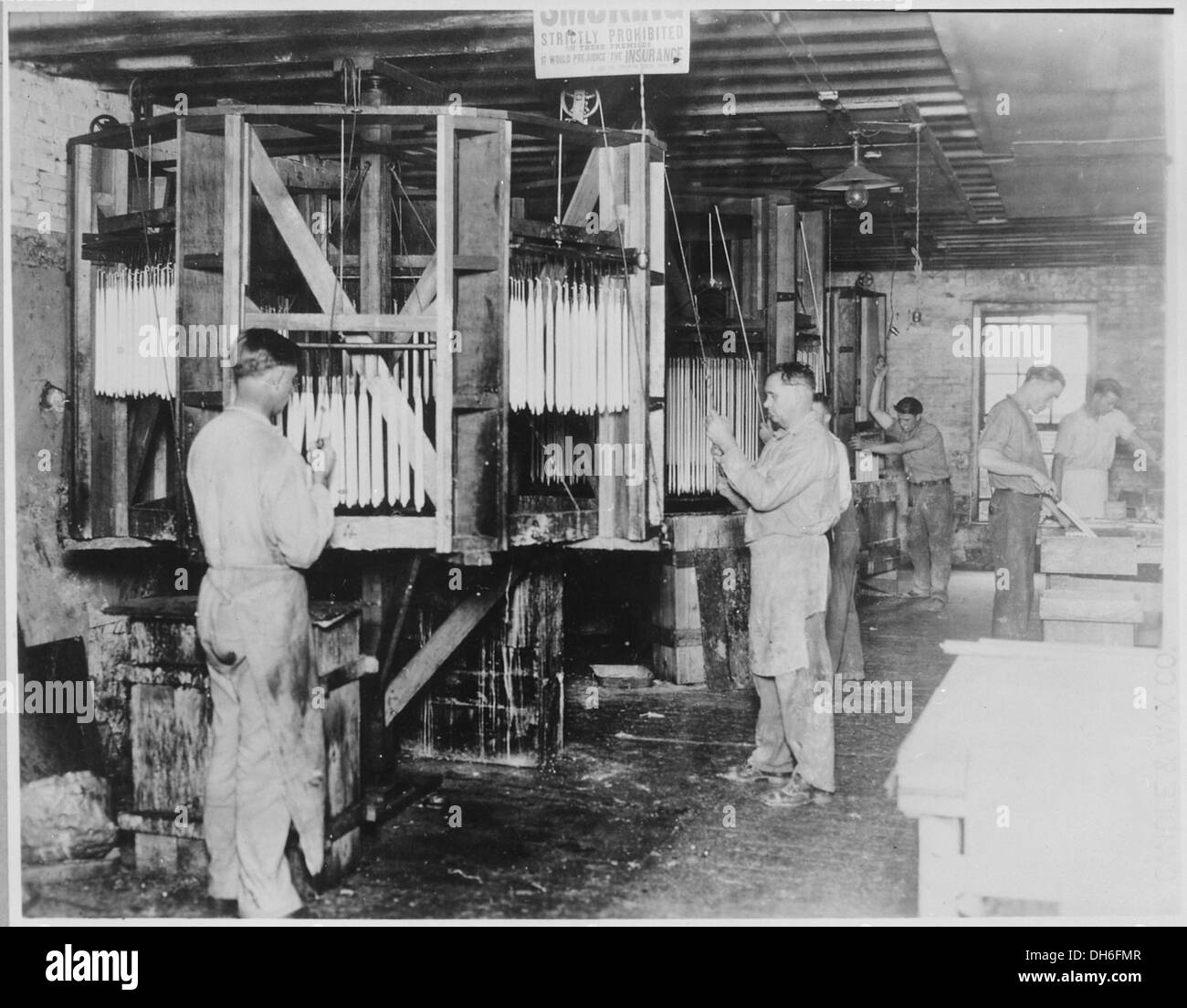 This photo captures workers at the Saint Louis Candle and Wax Company ...
