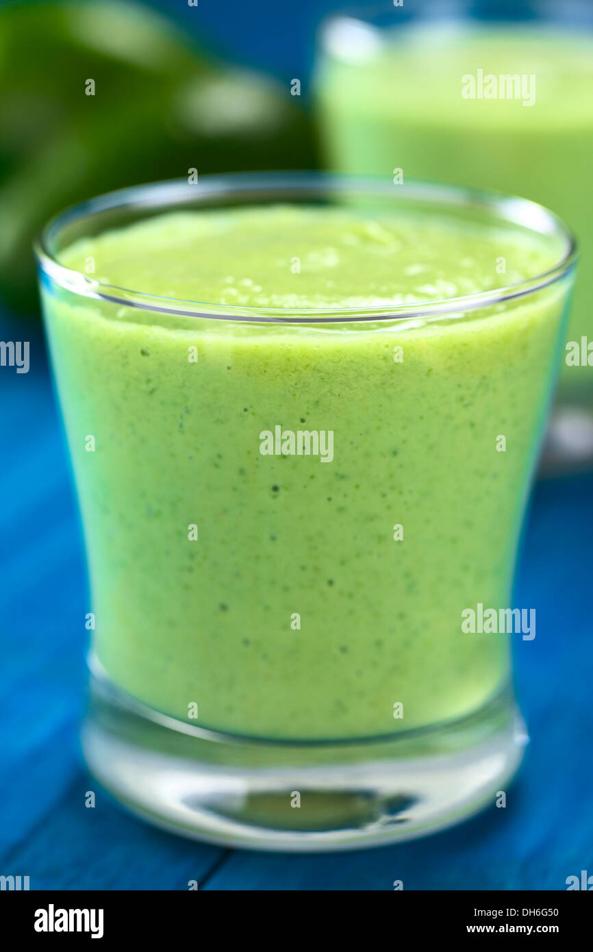 Healthy refreshing green smoothie made of fresh avocado, lime and ...