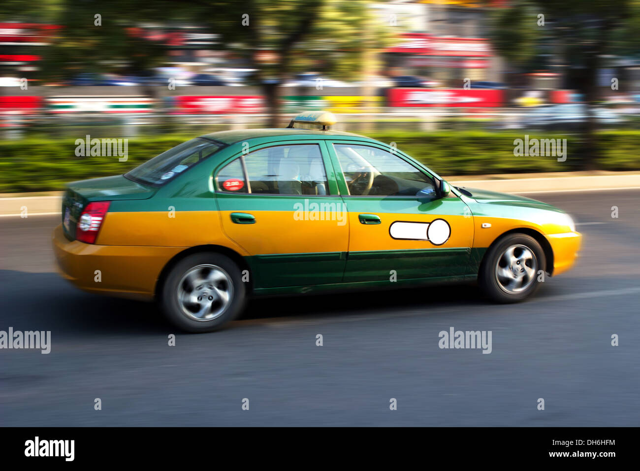 Beijing Taxi driving on the road Stock Photo - Alamy