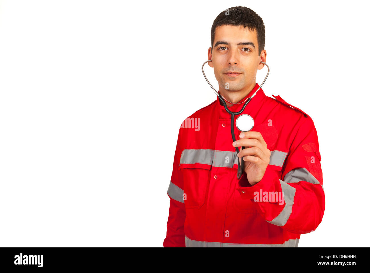 Paramedic man showing stethoscope isolated on white background Stock ...