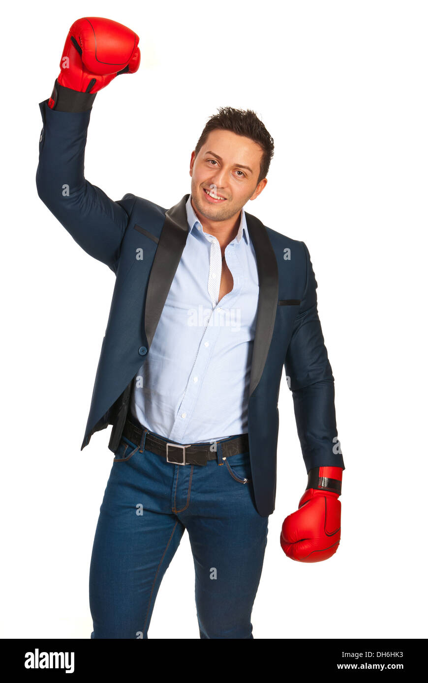 Successful business man raising hand in boxing gloves isolated on white ...