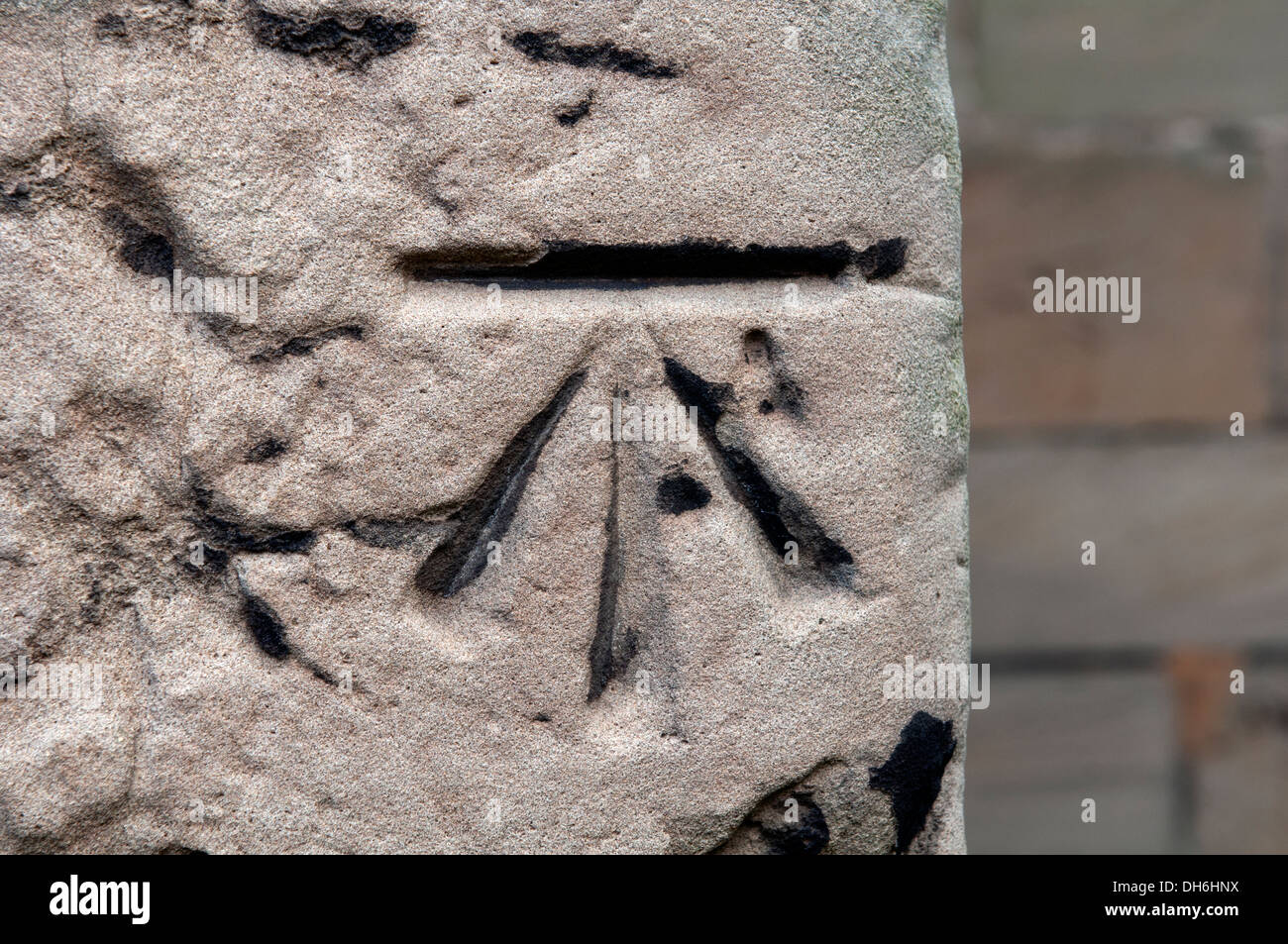 A benchmark on the wall of St. Michael`s Church, Stoke Prior ...