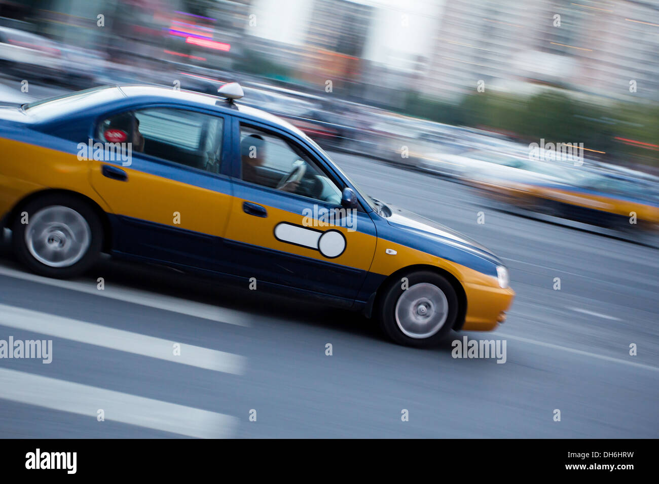 Beijing Taxi driving on the road Stock Photo - Alamy
