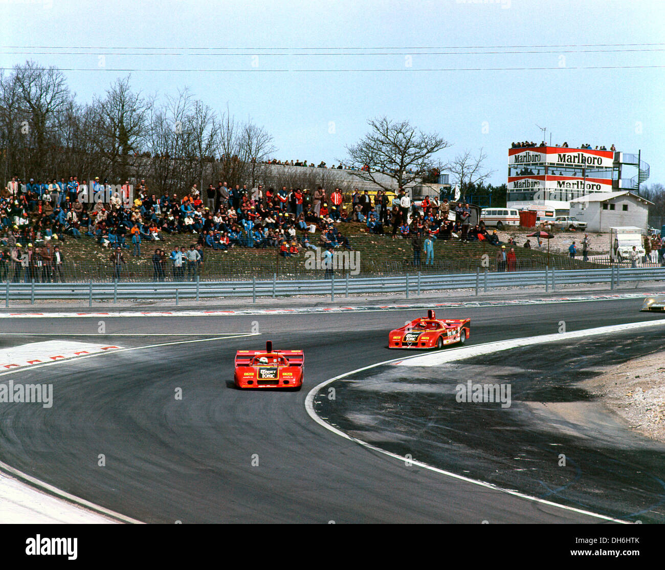 Alfa Romeo T33s racing at the Dijon 500kms race, France 1977 Stock ...