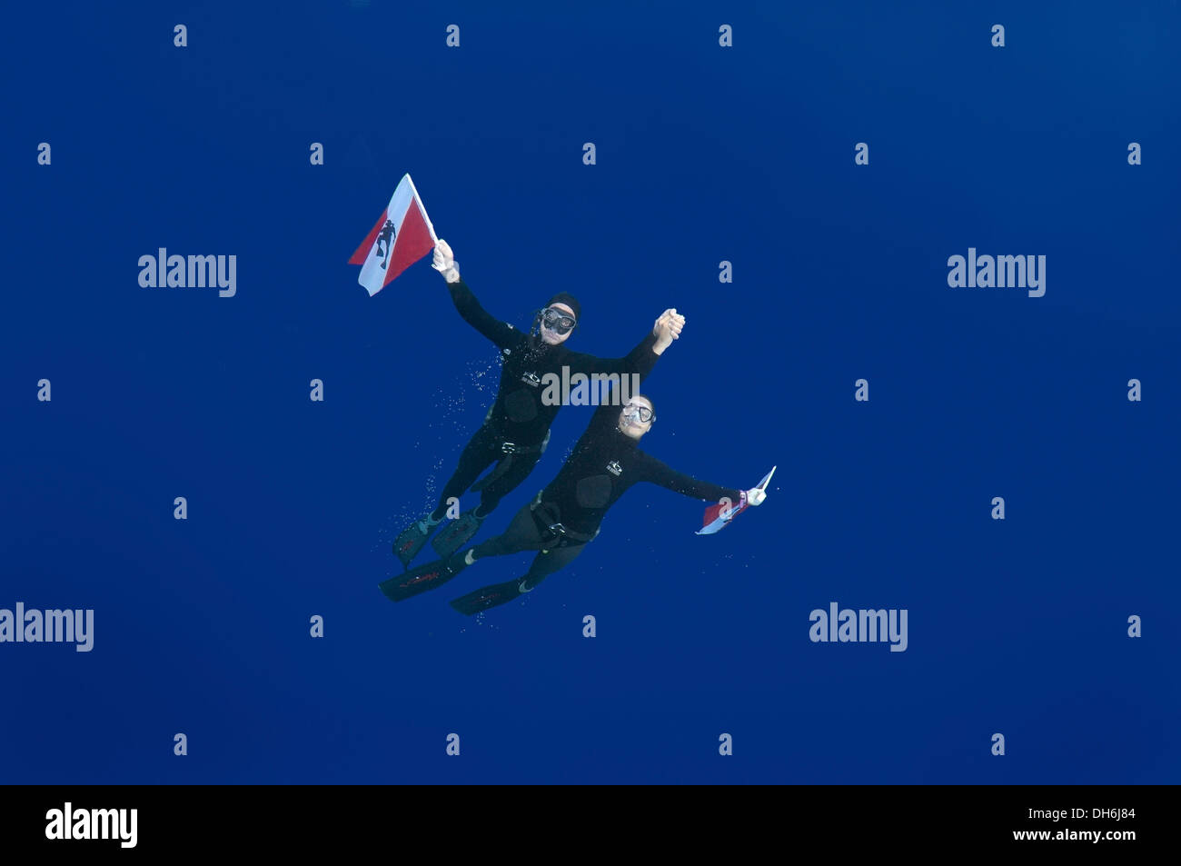 Man diving underwater greece flag hi-res stock photography and images ...