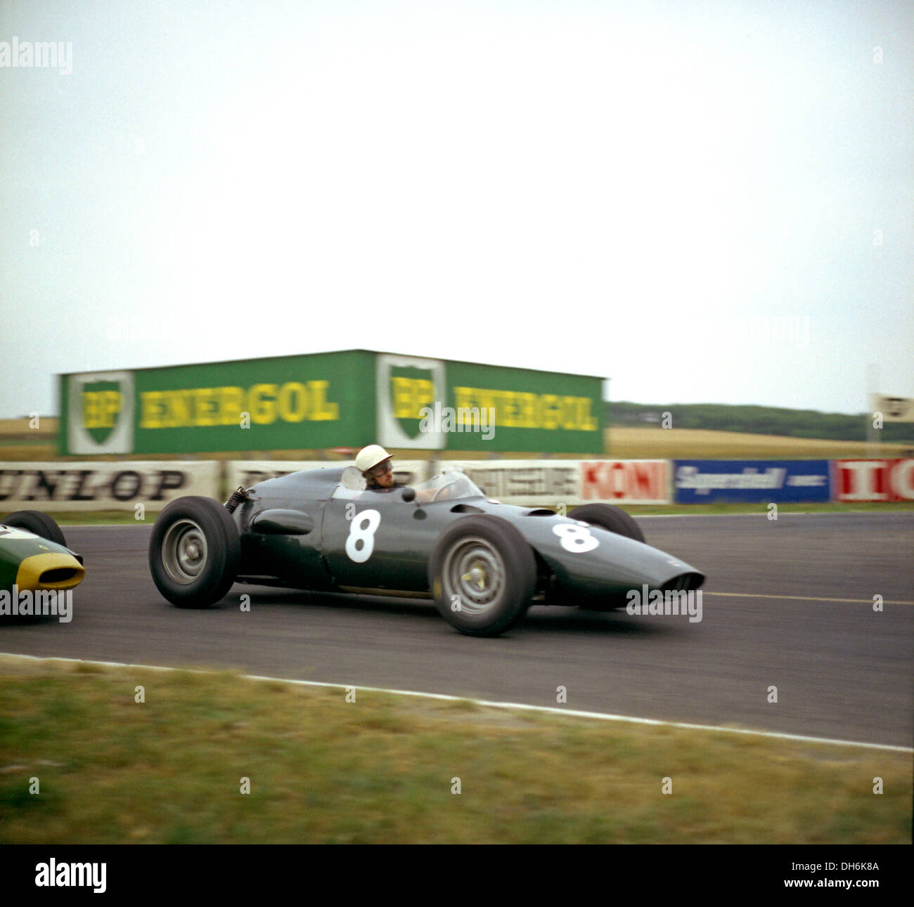 Joakim Bonnier driving his works BRM P48 in the French GP - seen at ...