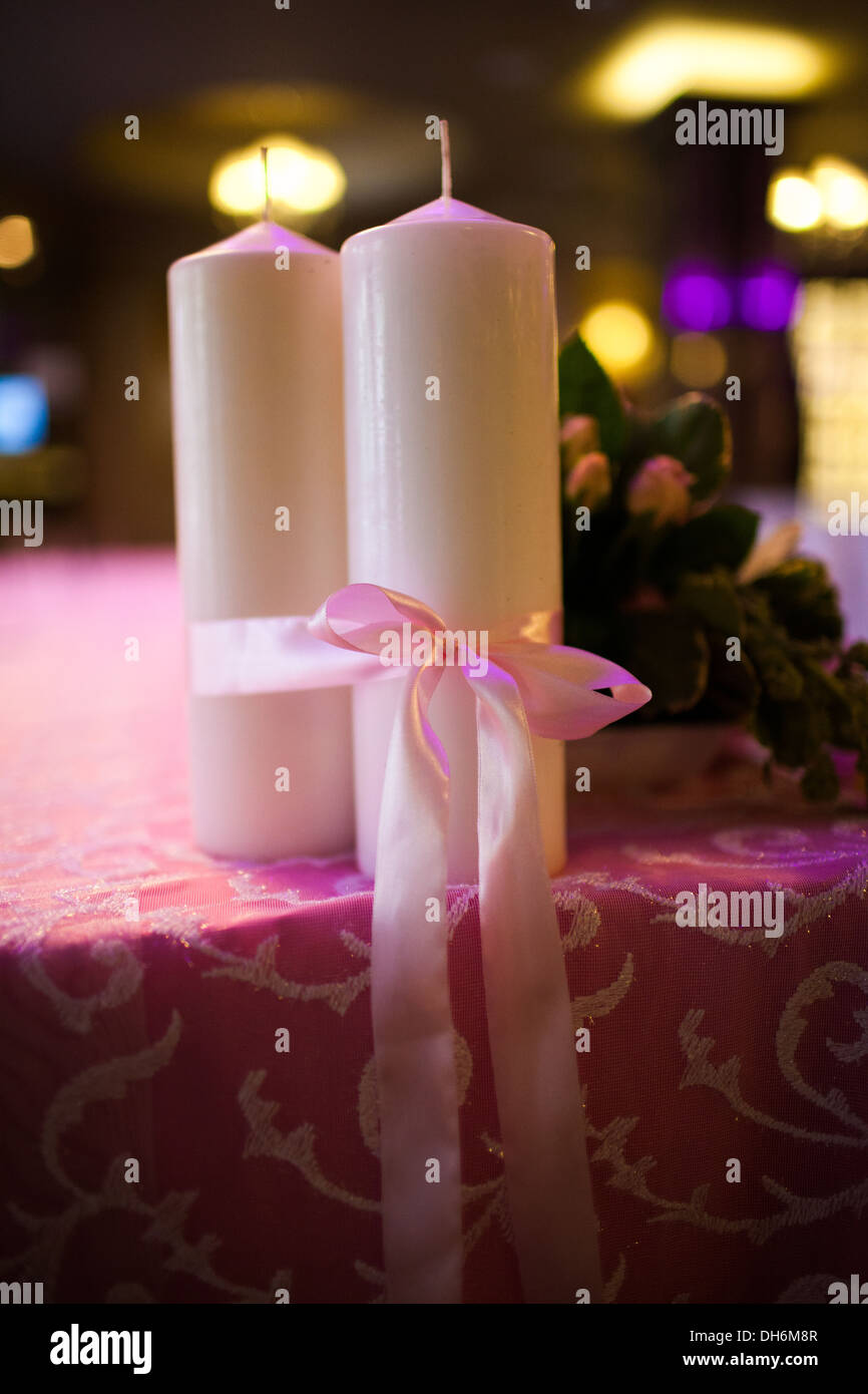 candles tied with a pink ribbon Stock Photo - Alamy