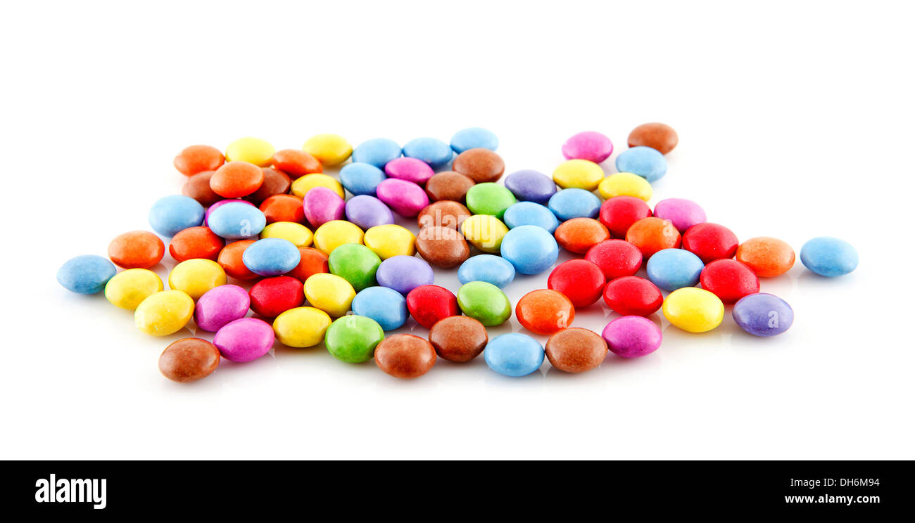 pile of colorful candy over white background Stock Photo - Alamy