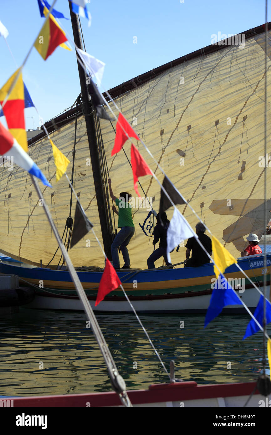 Day maritime traditions of the Port of Sete, gathering lateen sails ...