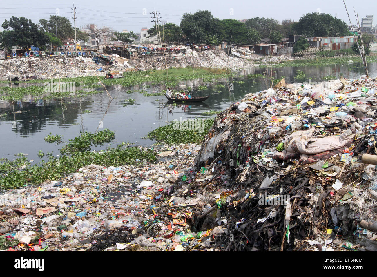 Household waste chokes and pollutes the Buriganga River, the lifeline ...