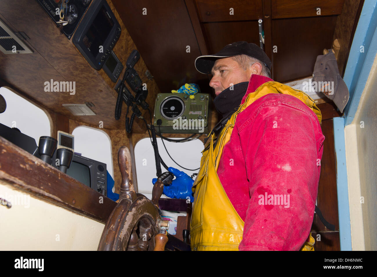 Captain talking on radio hi-res stock photography and images - Alamy