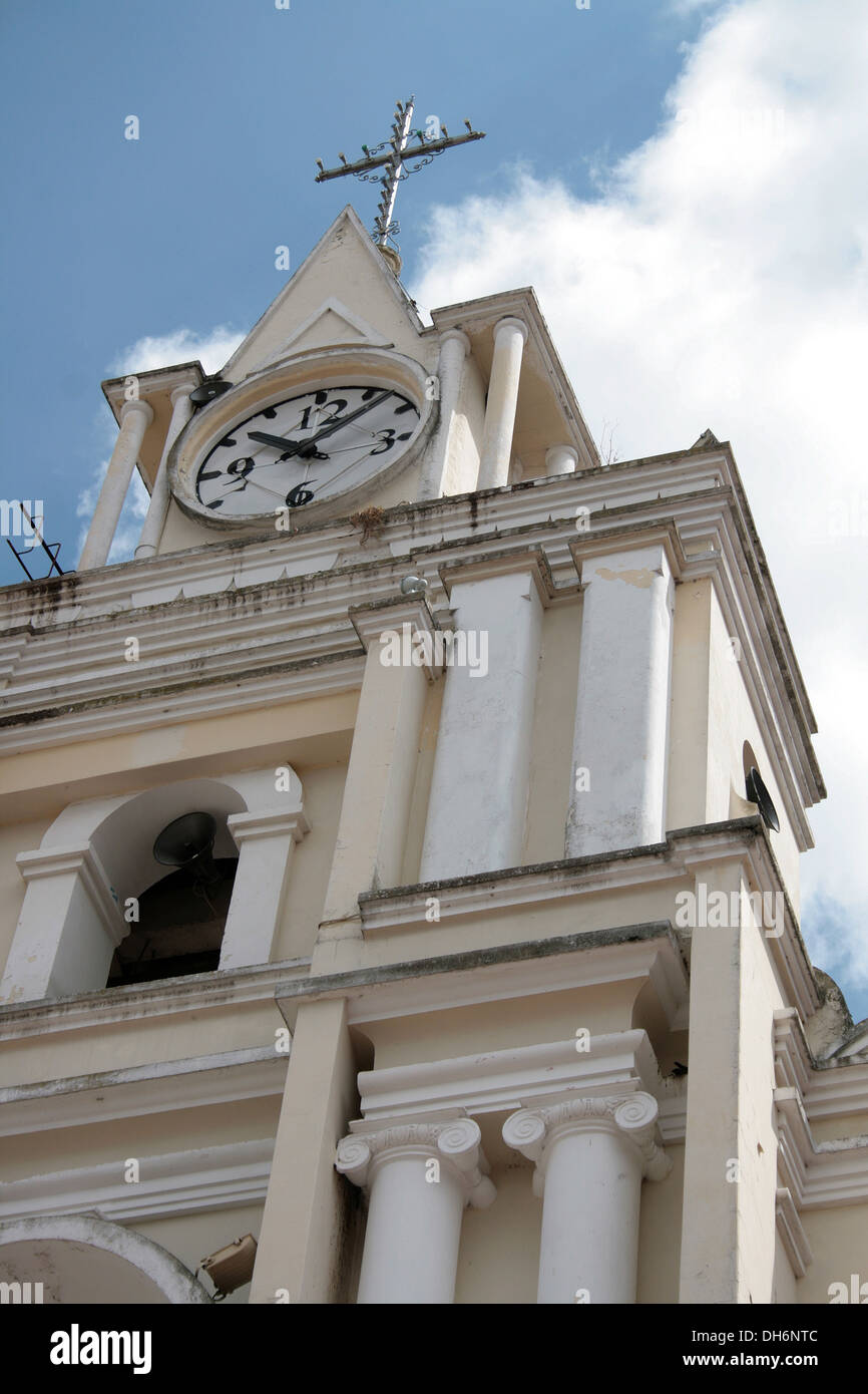 The clock and cross on the Catholic Church in San Pablo, Ecuador Stock ...