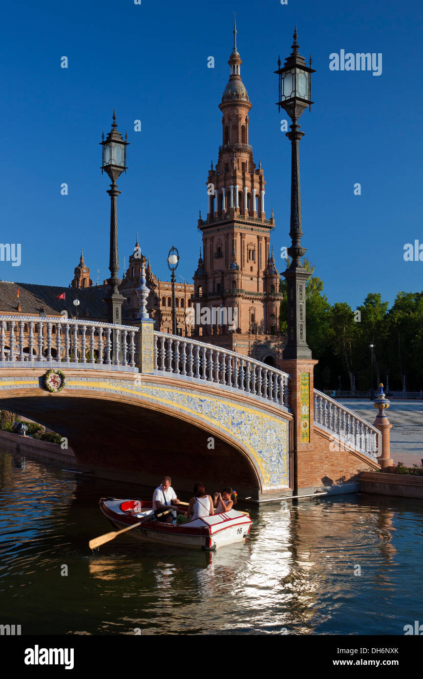 Leisure boat in the river at Plaza de España in Seville Stock Photo - Alamy