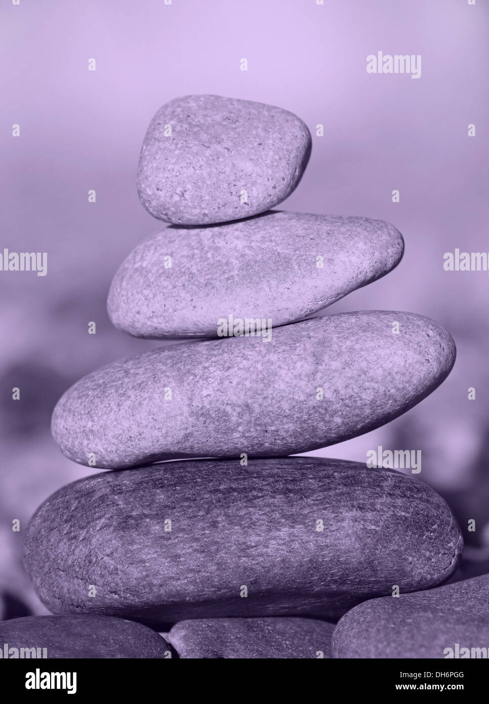 stack of four stones in blue color Stock Photo - Alamy