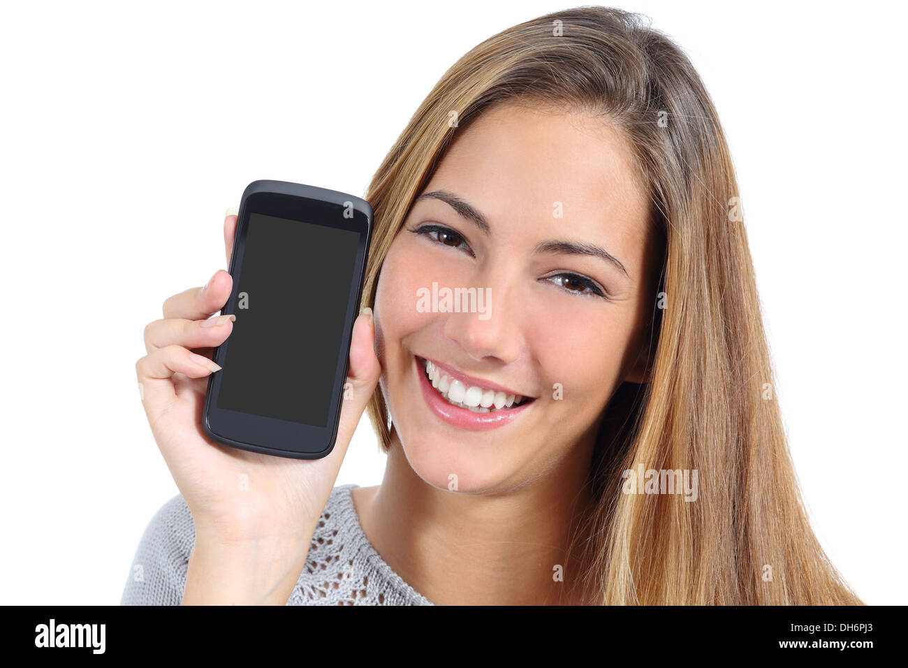 Cute girl showing a blank smart phone screen isolated on a white ...