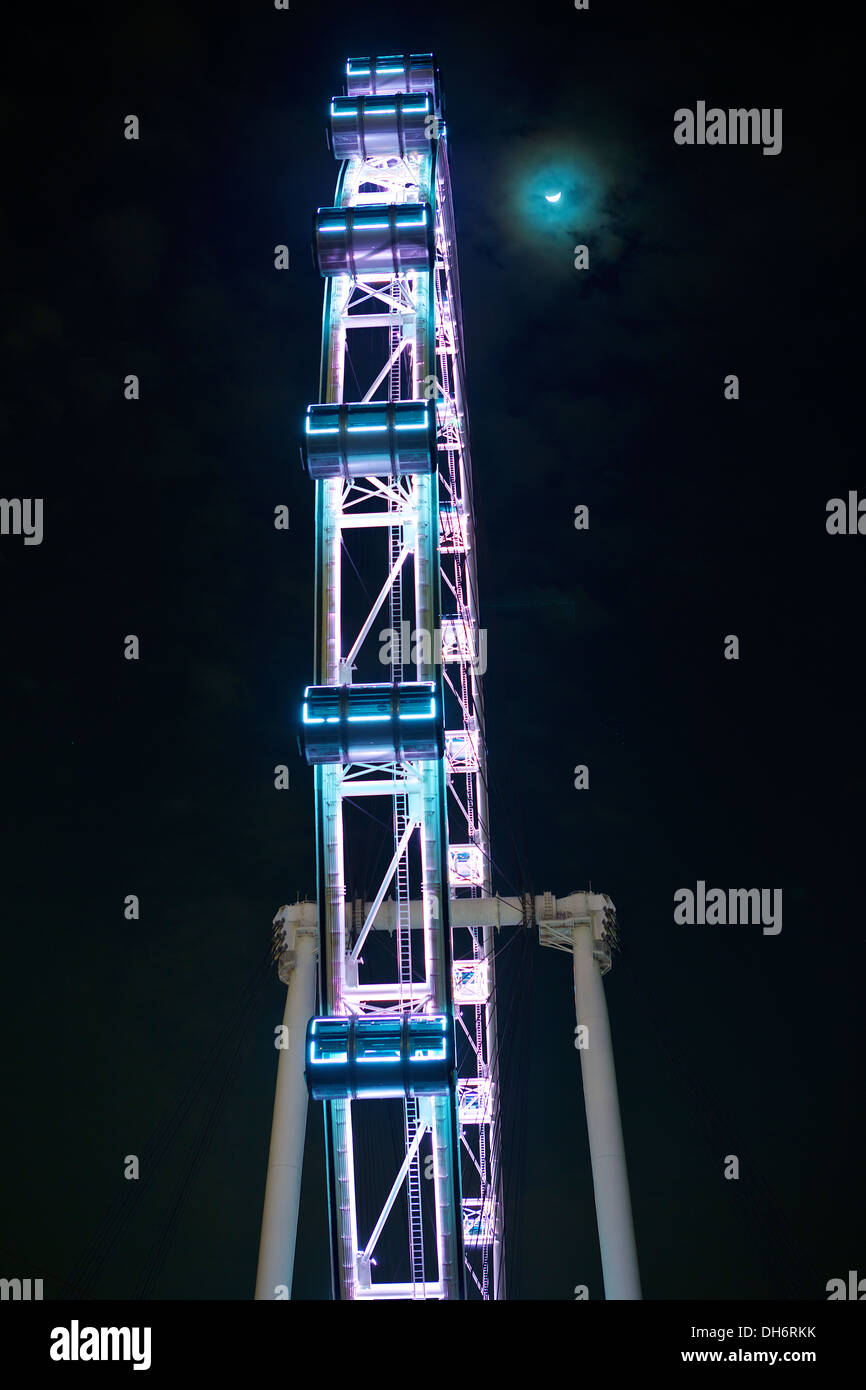 Moon over The Singapore Flyer Stock Photo - Alamy