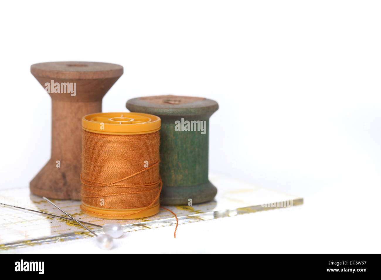 Sewing and Quilting Thread With Notions On White Stock Photo - Alamy