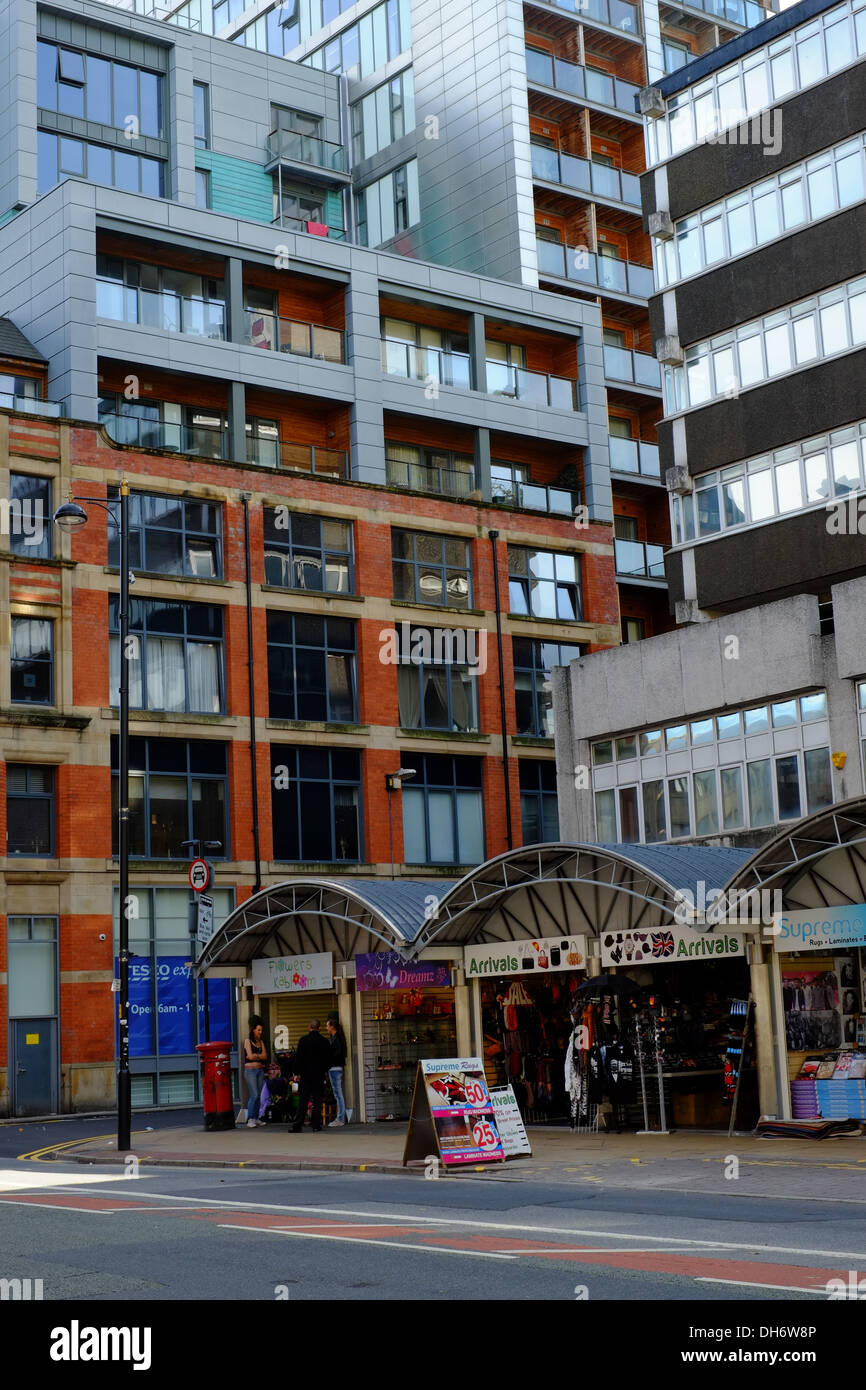 Small Retail Outlets Overlooked by Modern Apartment Buildings ...