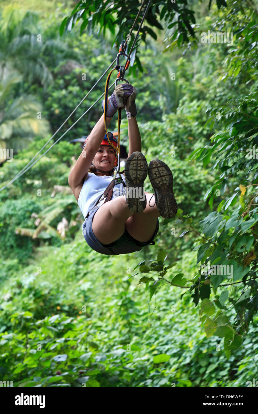 Female zip lining hi-res stock photography and images - Alamy