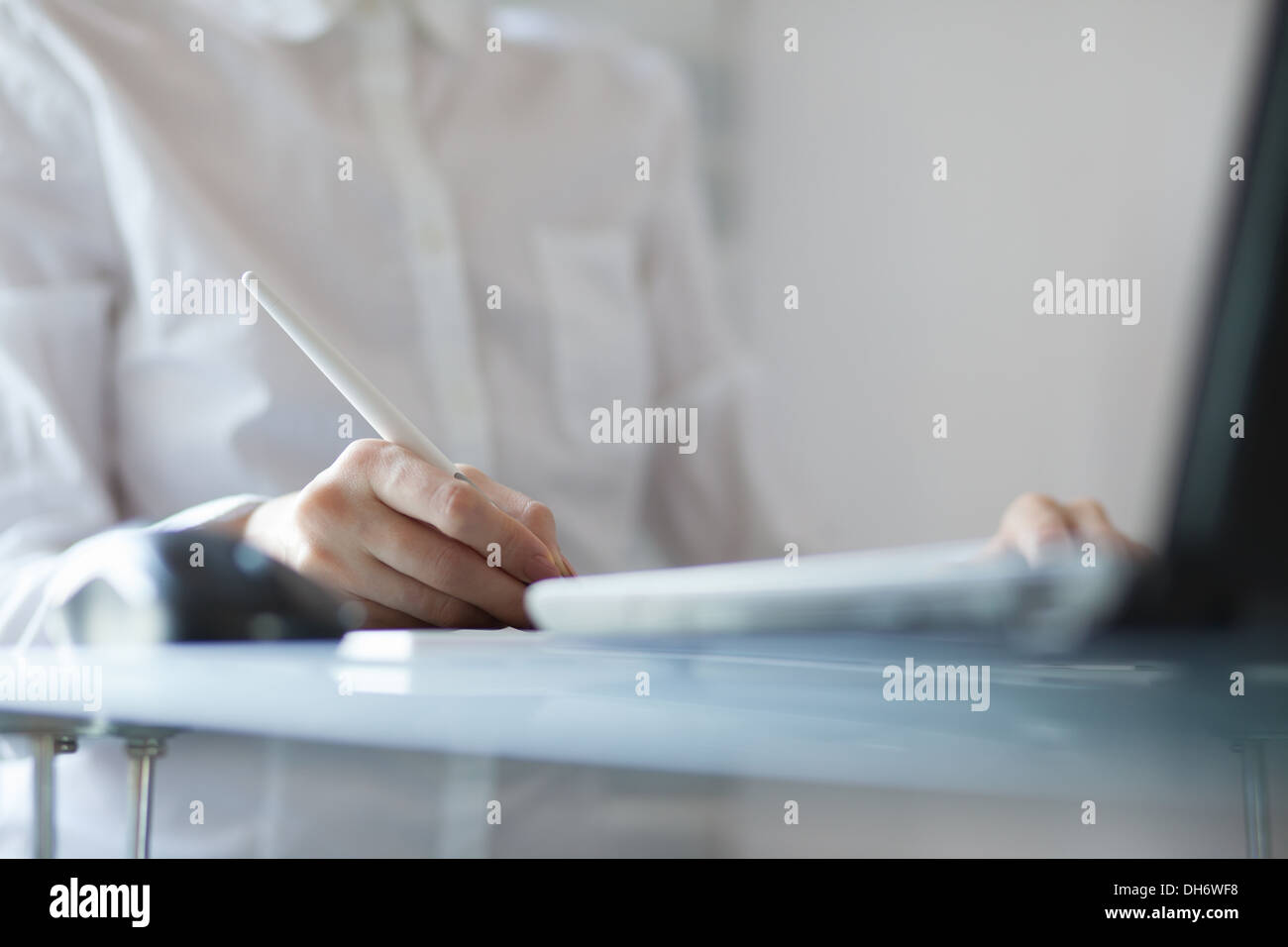 Female designer using graphics pad in office Stock Photo - Alamy