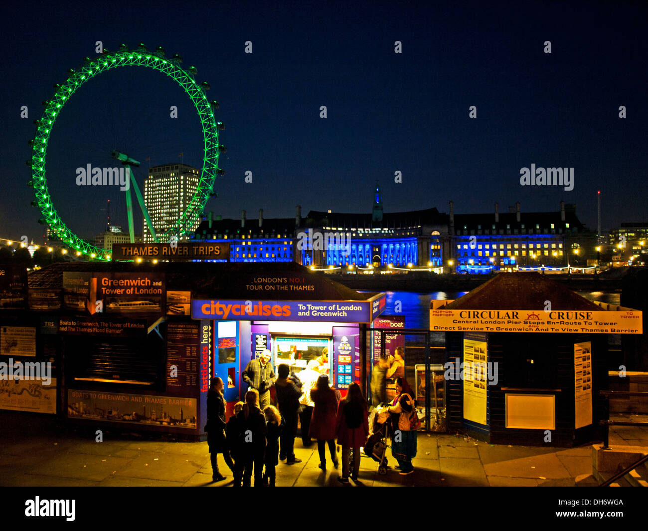 The London Eye and River Thames waterfront at night, London, England ...