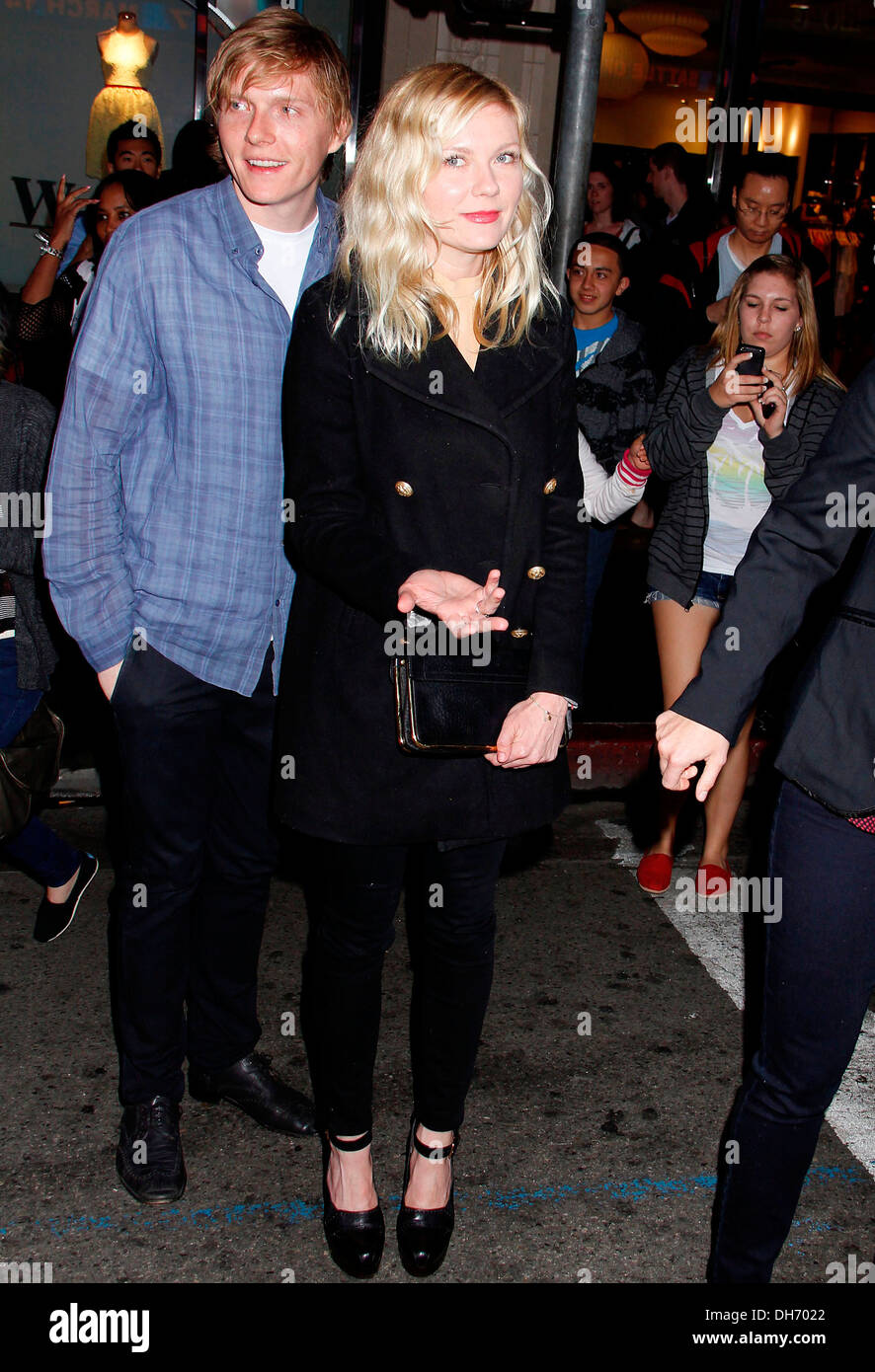Kirsten Dunst and her brother Christian walking on Hollywood Boulevard ...