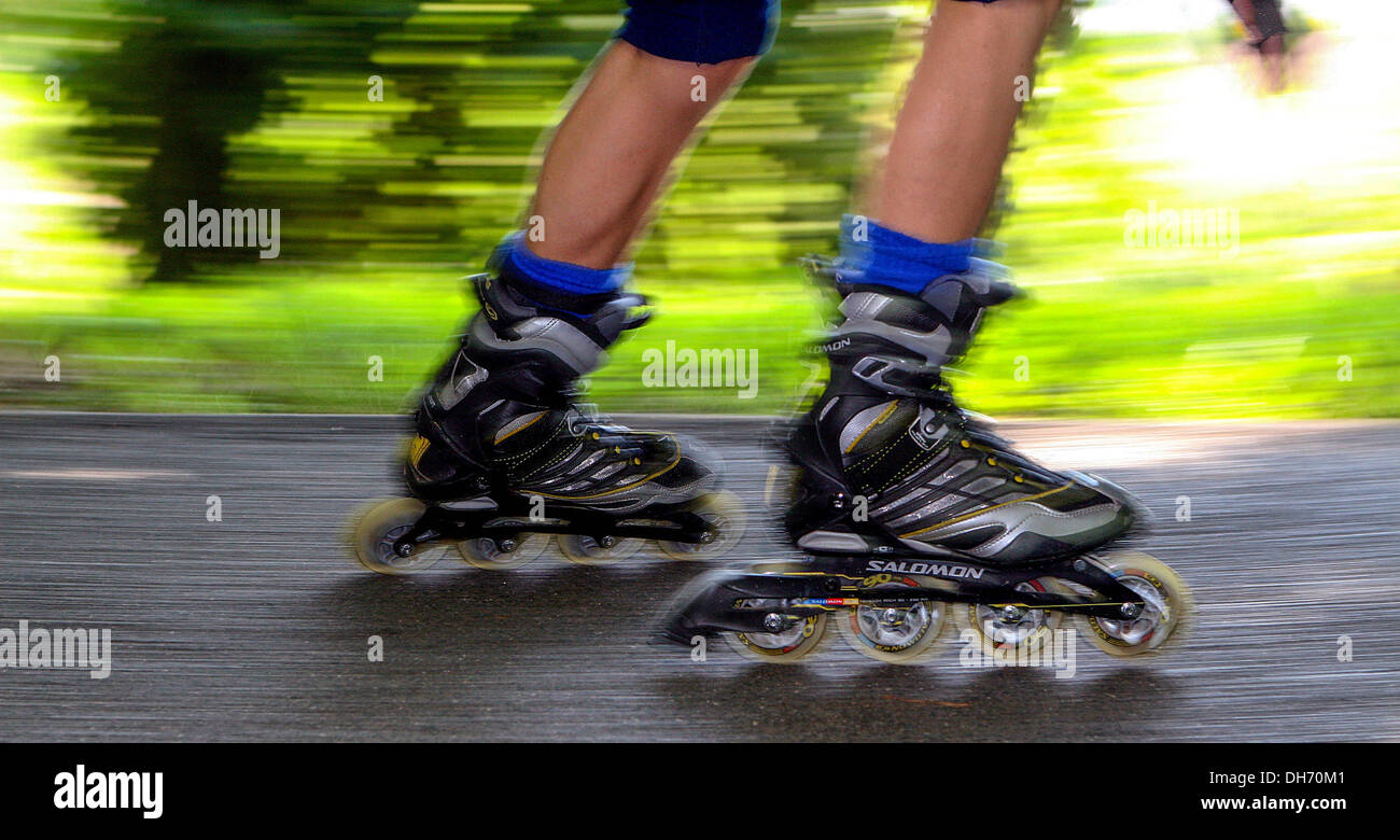In-line skating blur Stock Photo - Alamy
