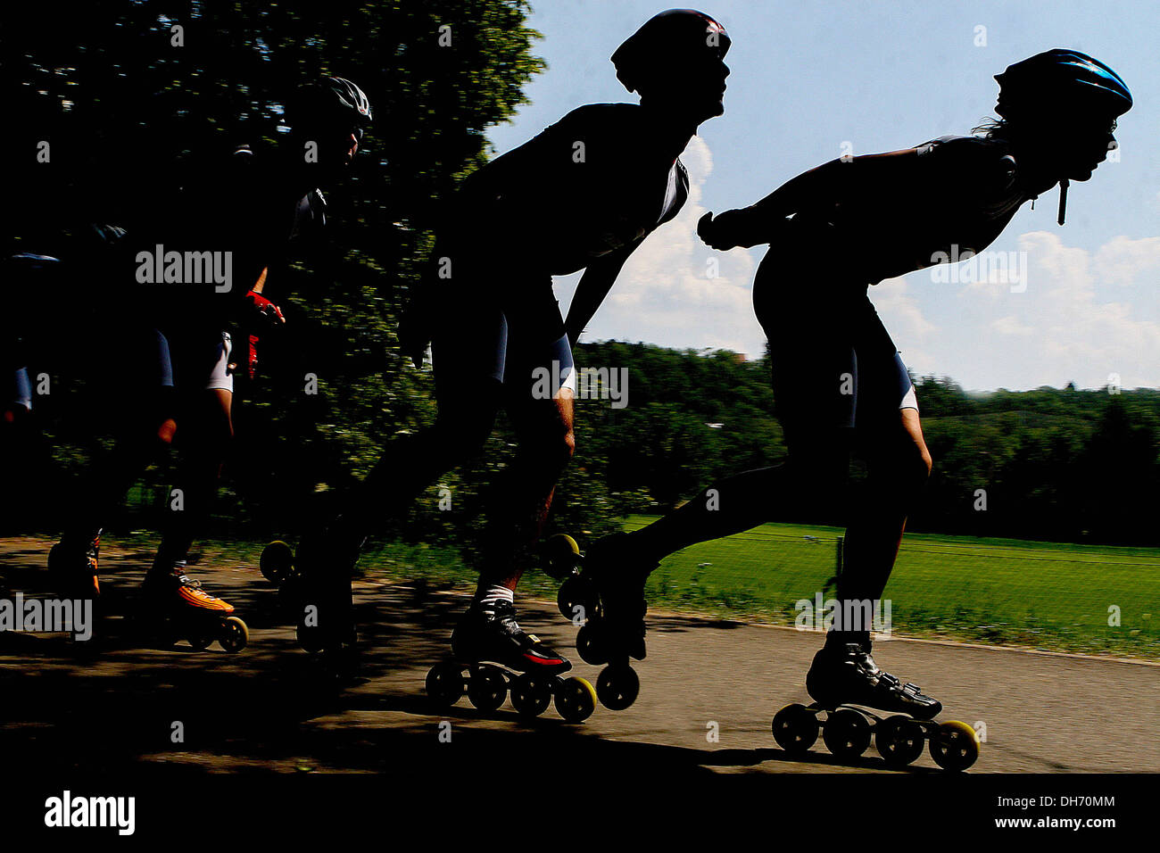In-line skating silhouette Stock Photo - Alamy