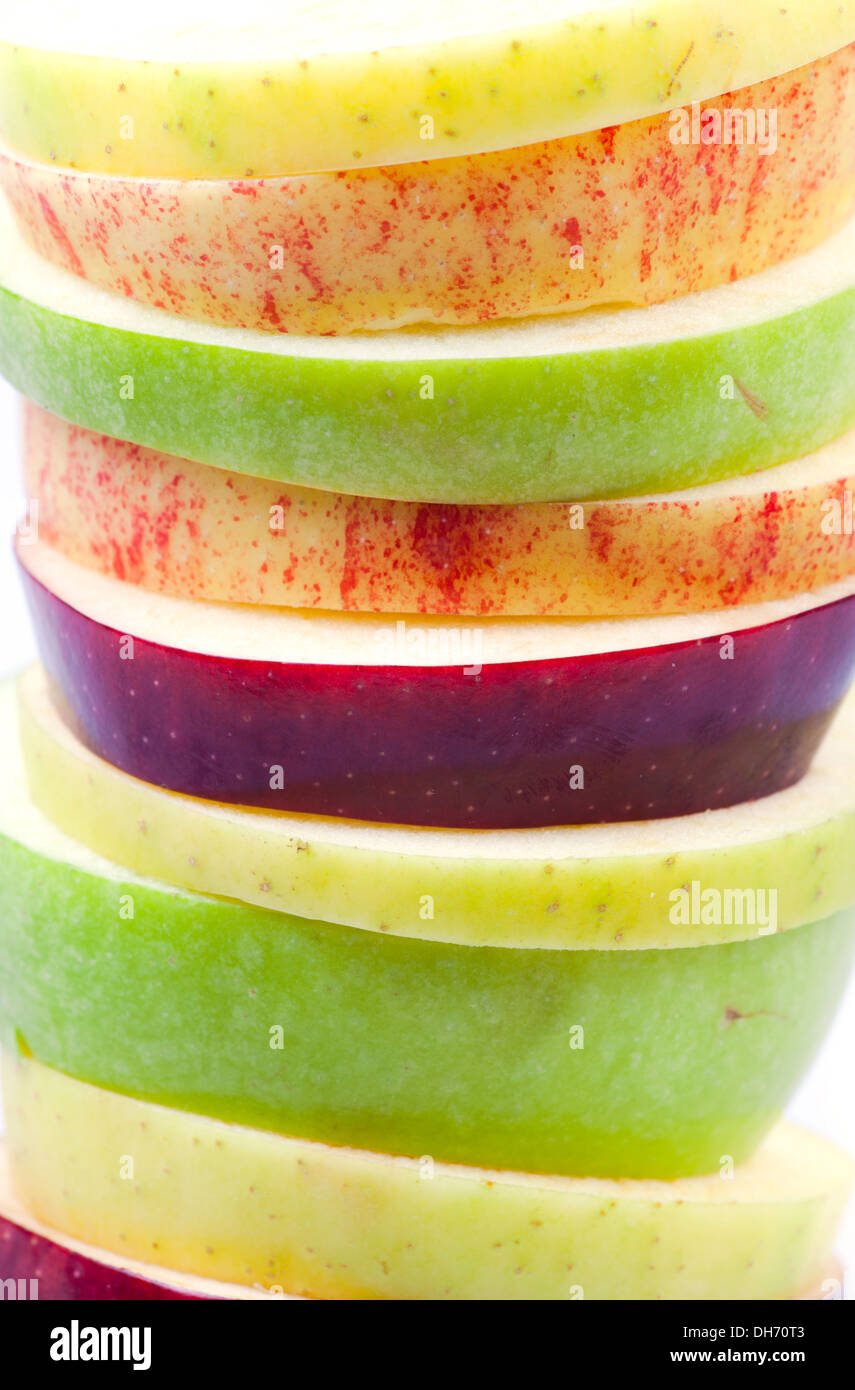 sliced and stacked different color apples Stock Photo - Alamy