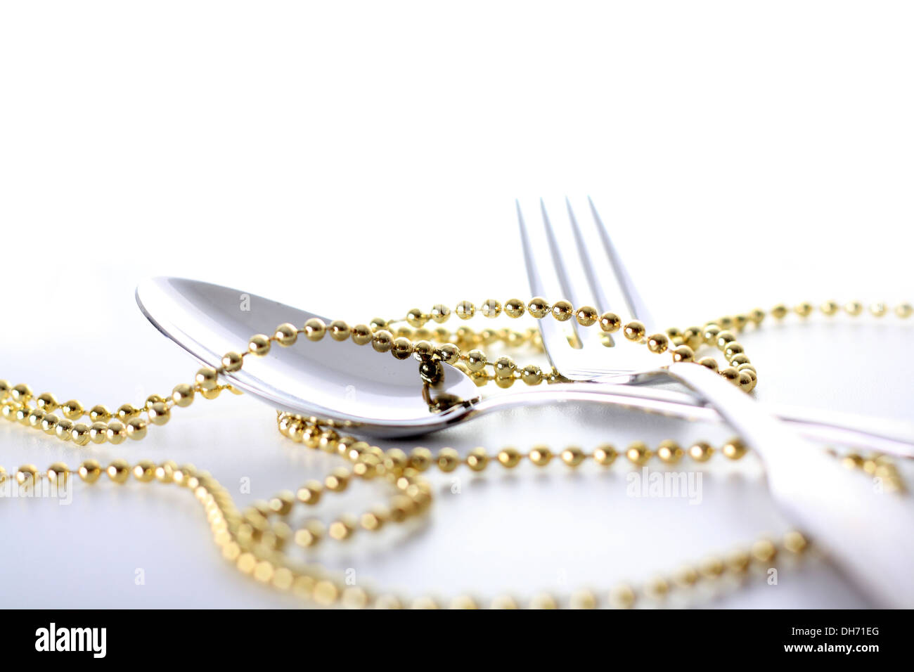 Cutlery golden spoon hi-res stock photography and images - Alamy