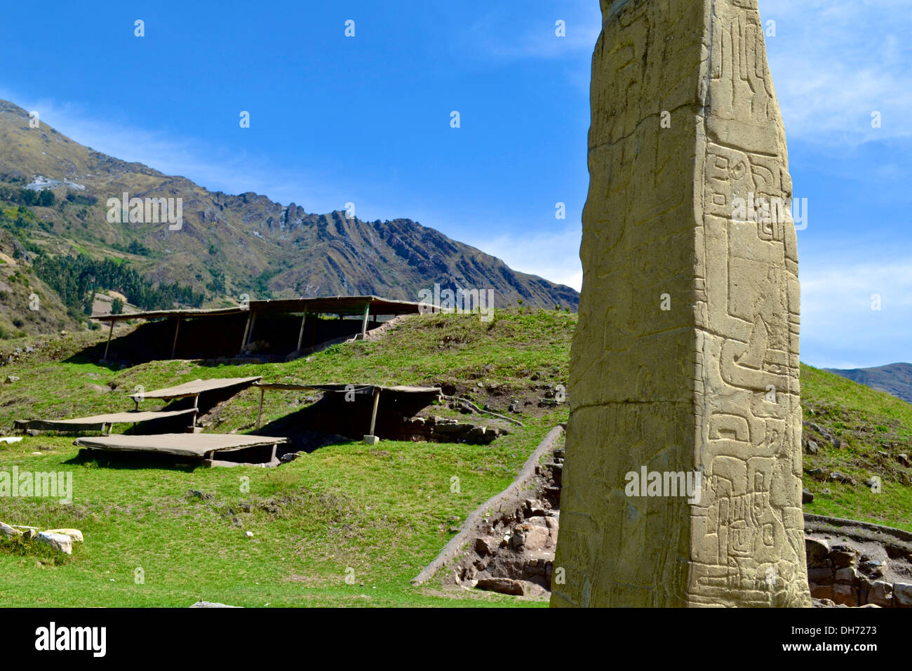 A carved stone obelisk at the Chavin de Huantar archaeological site ...