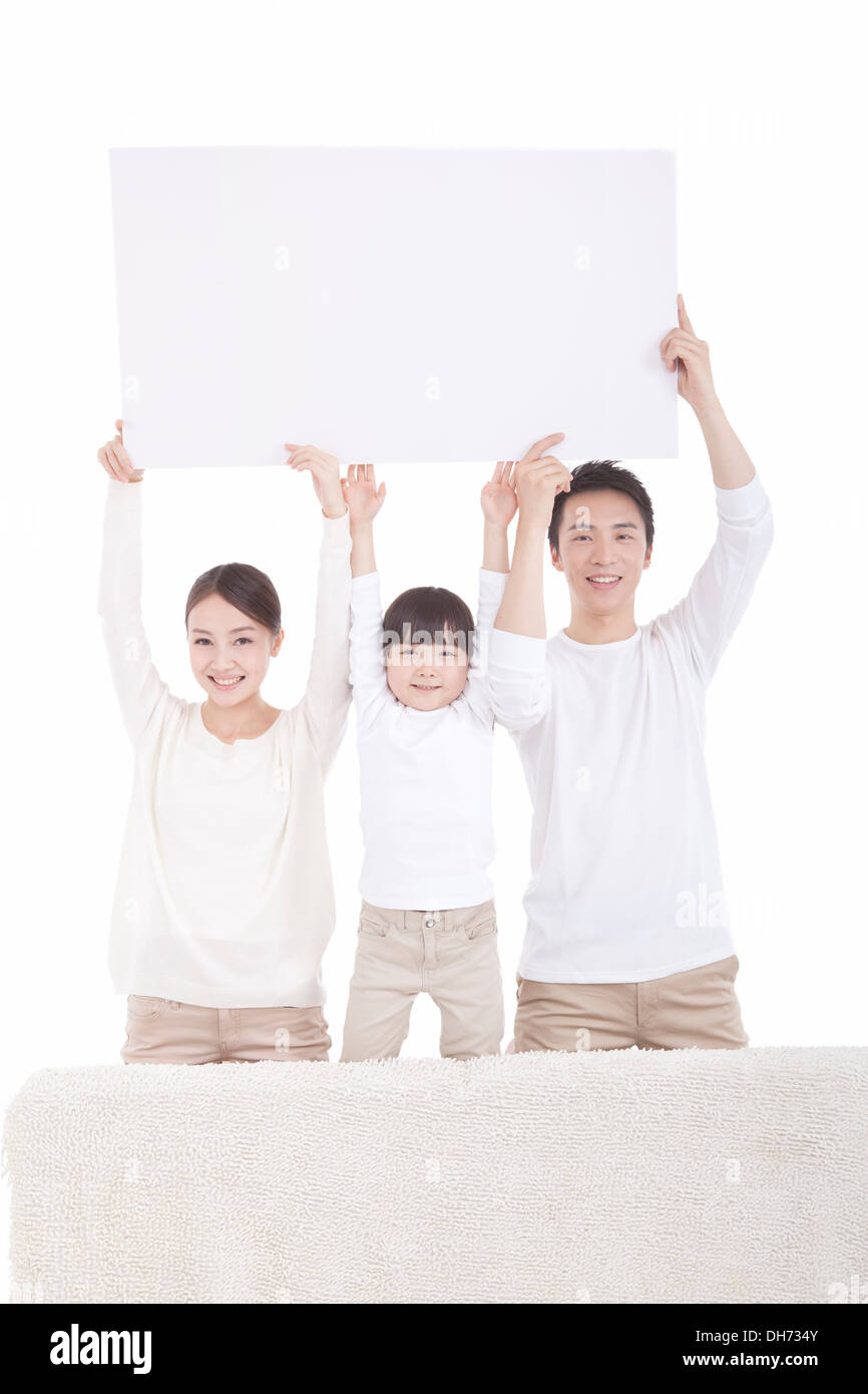 A family of three and whiteboard Stock Photo - Alamy