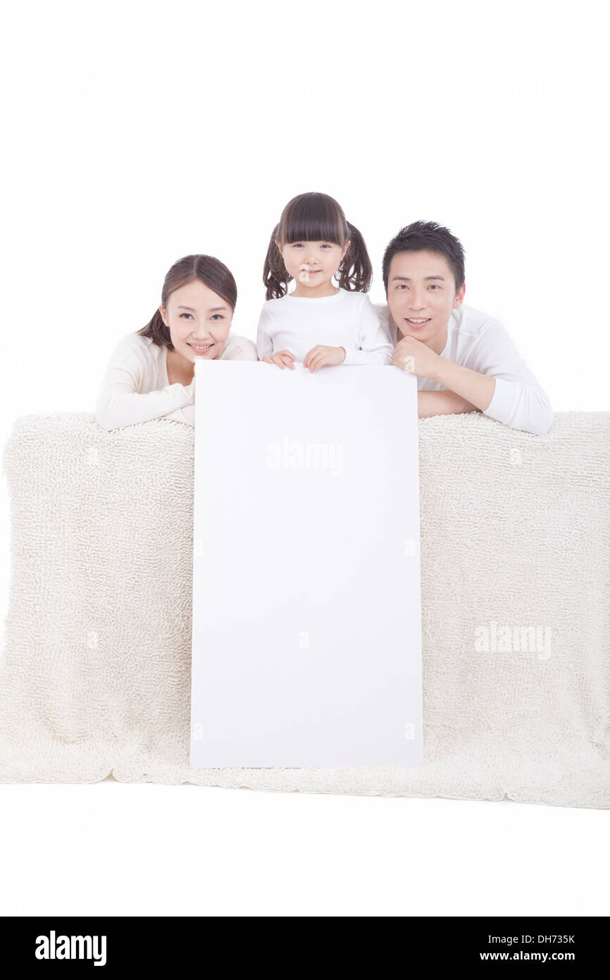 A family of three and whiteboard Stock Photo - Alamy