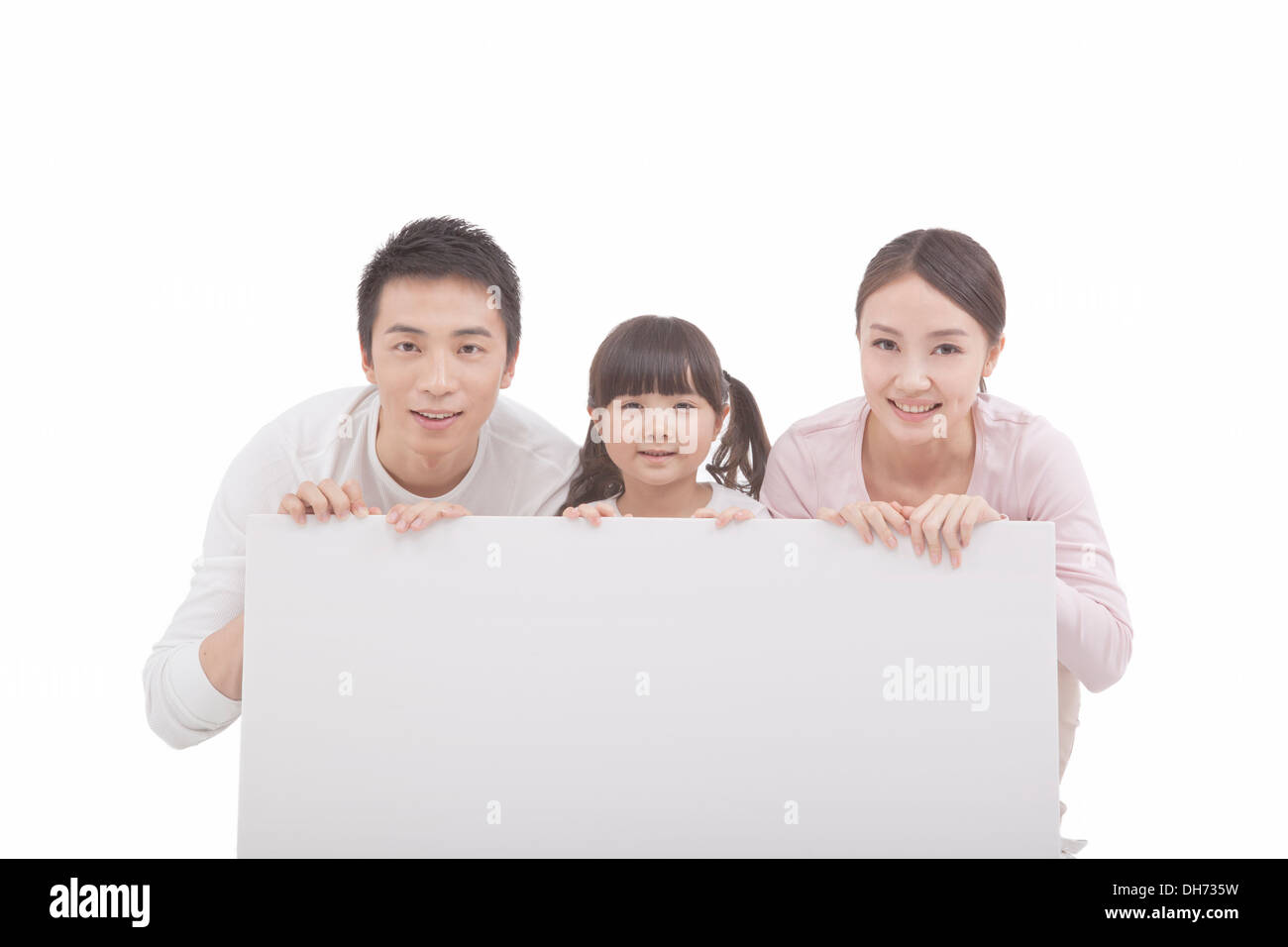 A family of three and whiteboard Stock Photo - Alamy