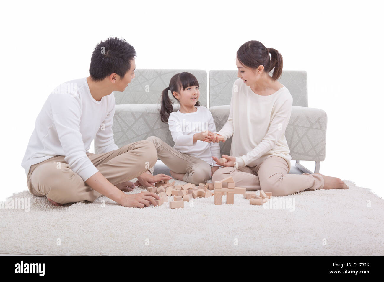 The happy life of A family of three Stock Photo - Alamy