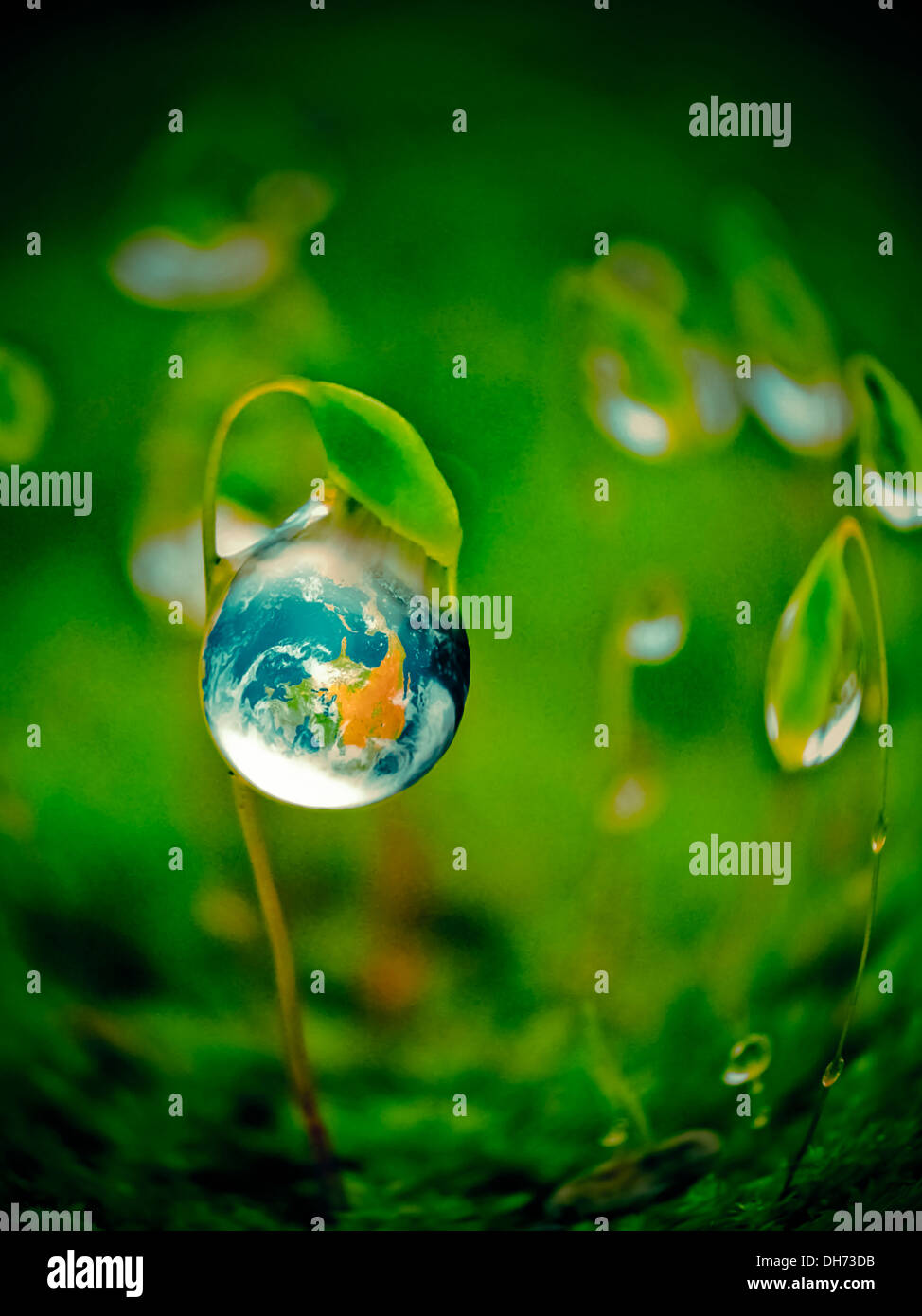 Green energy concept, Fresh Earth in a water drop Stock Photo - Alamy